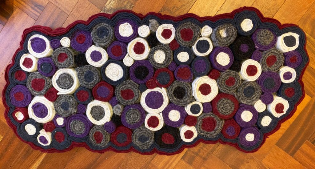 Reuse old jumpers to make a soft felted wool rug - Less Waste