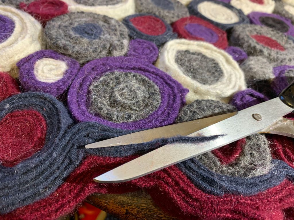 Reuse old jumpers to make a soft felted wool rug - Less Waste